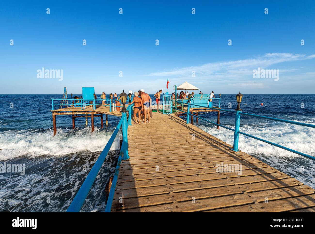 Red Sea near Marsa Alam, Egypt, Africa. Wooden pier above the coral ...