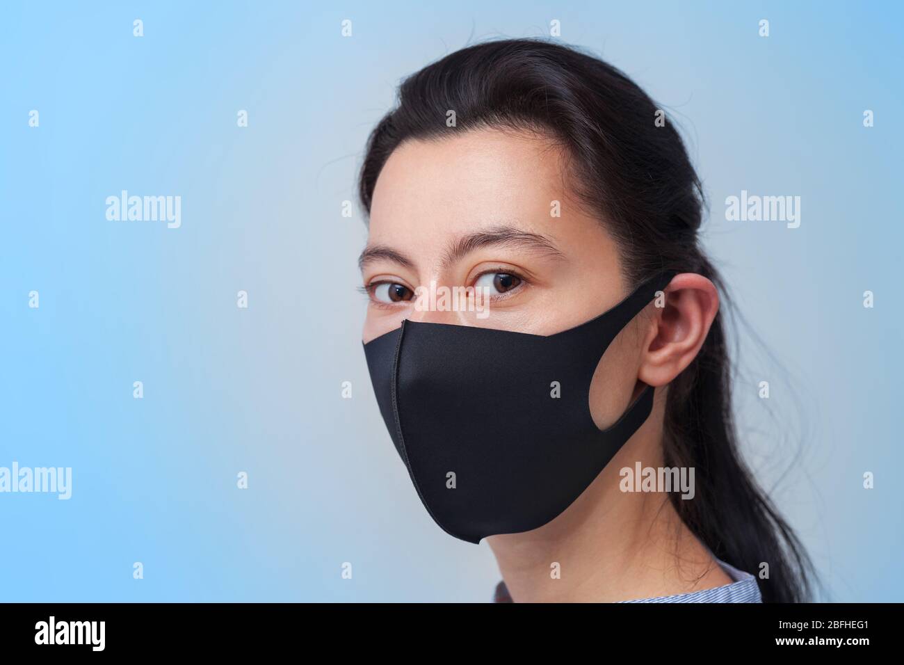 A close up of a person wearing a mask. High quality photo Stock Photo ...