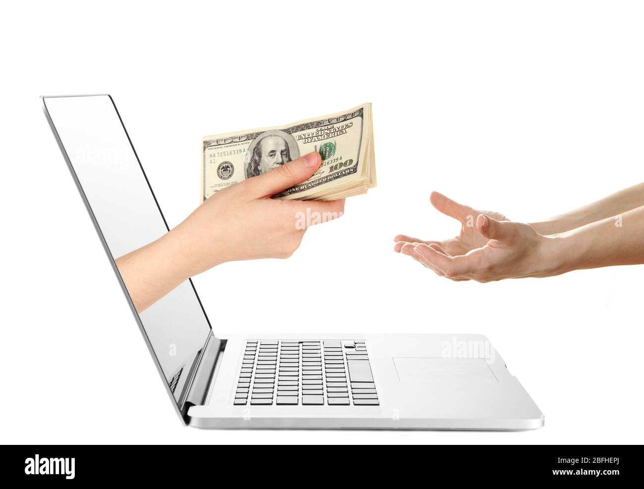 Hand giving money from laptop screen isolated on white Stock Photo - Alamy