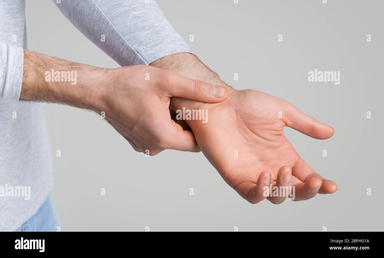 Wrist pulse check hi-res stock photography and images - Alamy