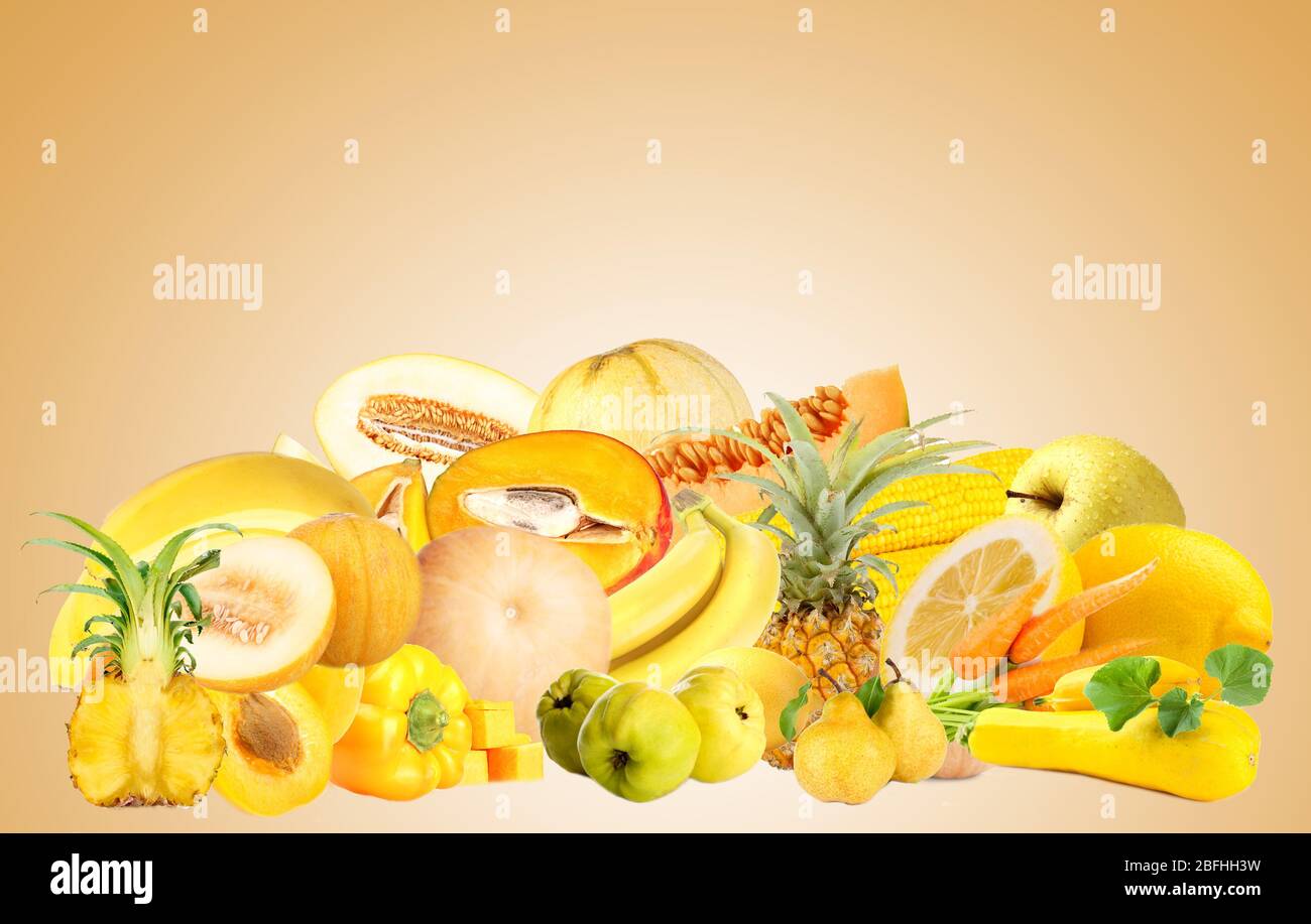 Collection of fruits and vegetables on beige background Stock Photo - Alamy