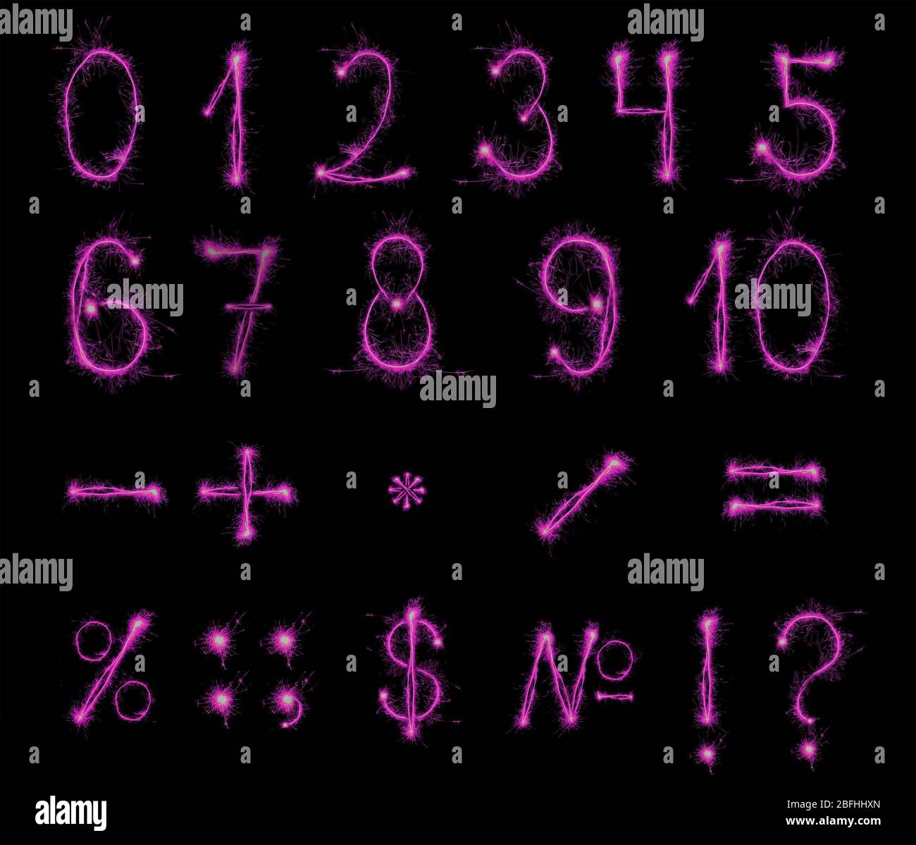 Fireworks numbers and symbols on black background Stock Photo - Alamy