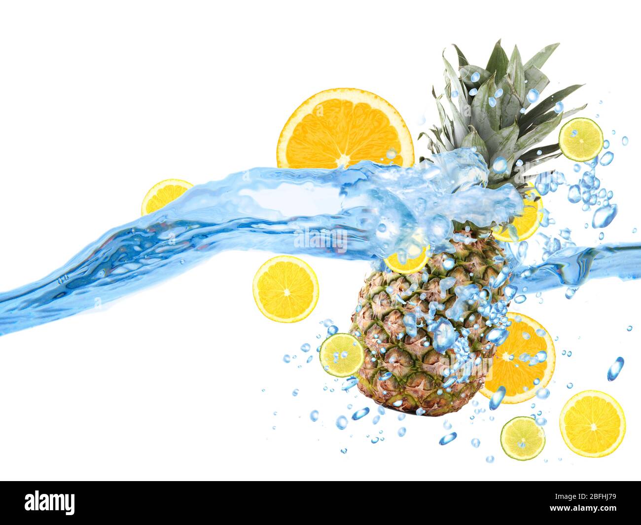 Fresh fruits dropped into water Stock Photo - Alamy