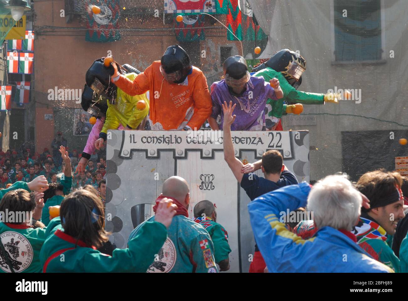 IVREA, ITALY -March 2011: The battle of the oranges at the Carnival of ...
