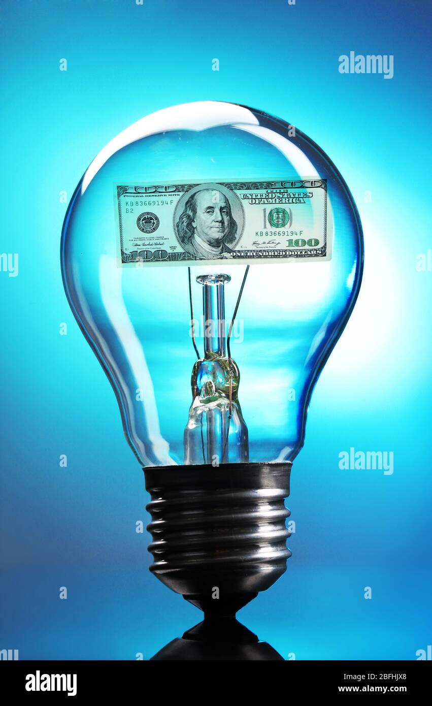Dollar inside light bulb hi-res stock photography and images - Alamy