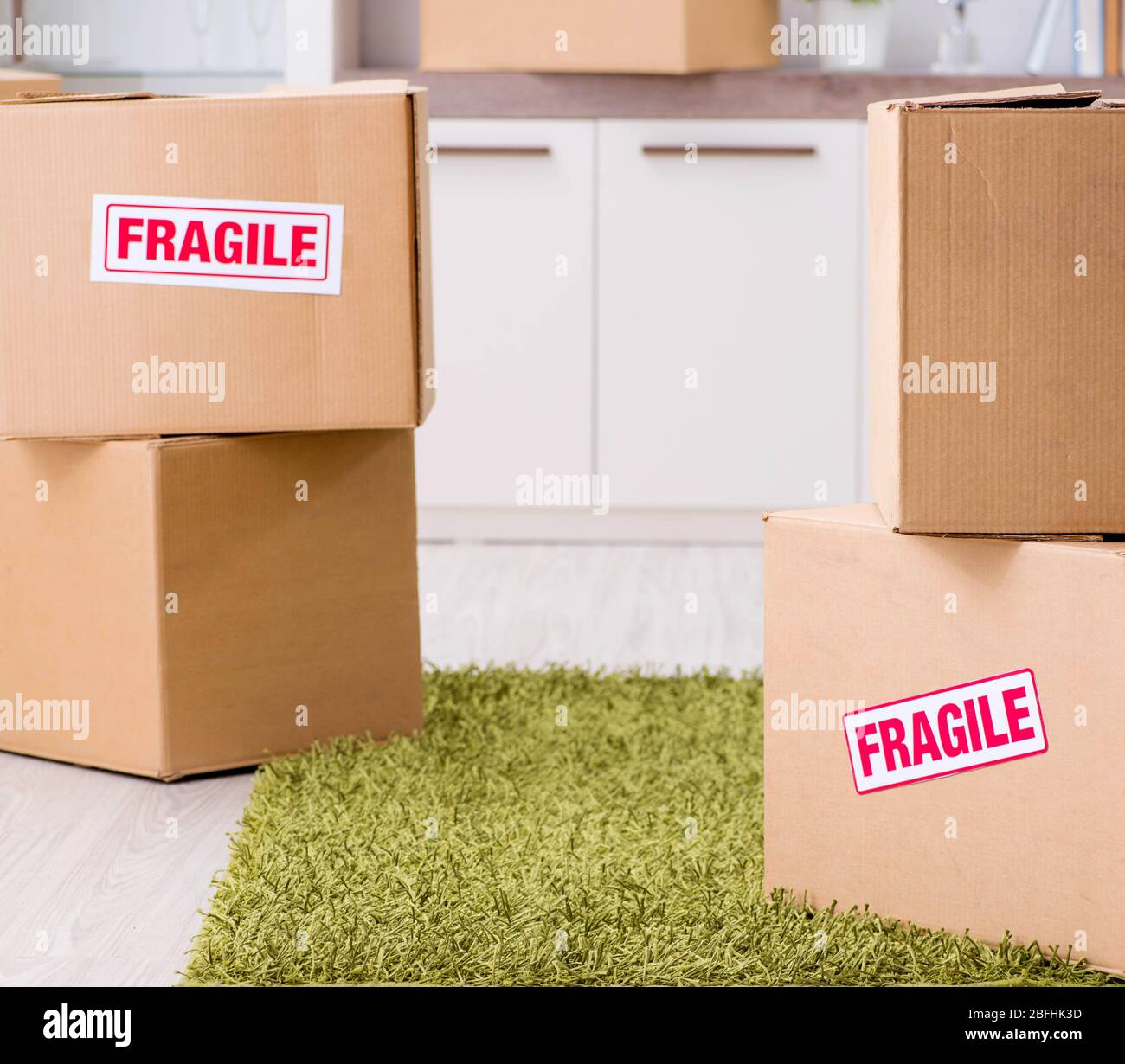 The man moving house and relocating with fragile items Stock Photo - Alamy