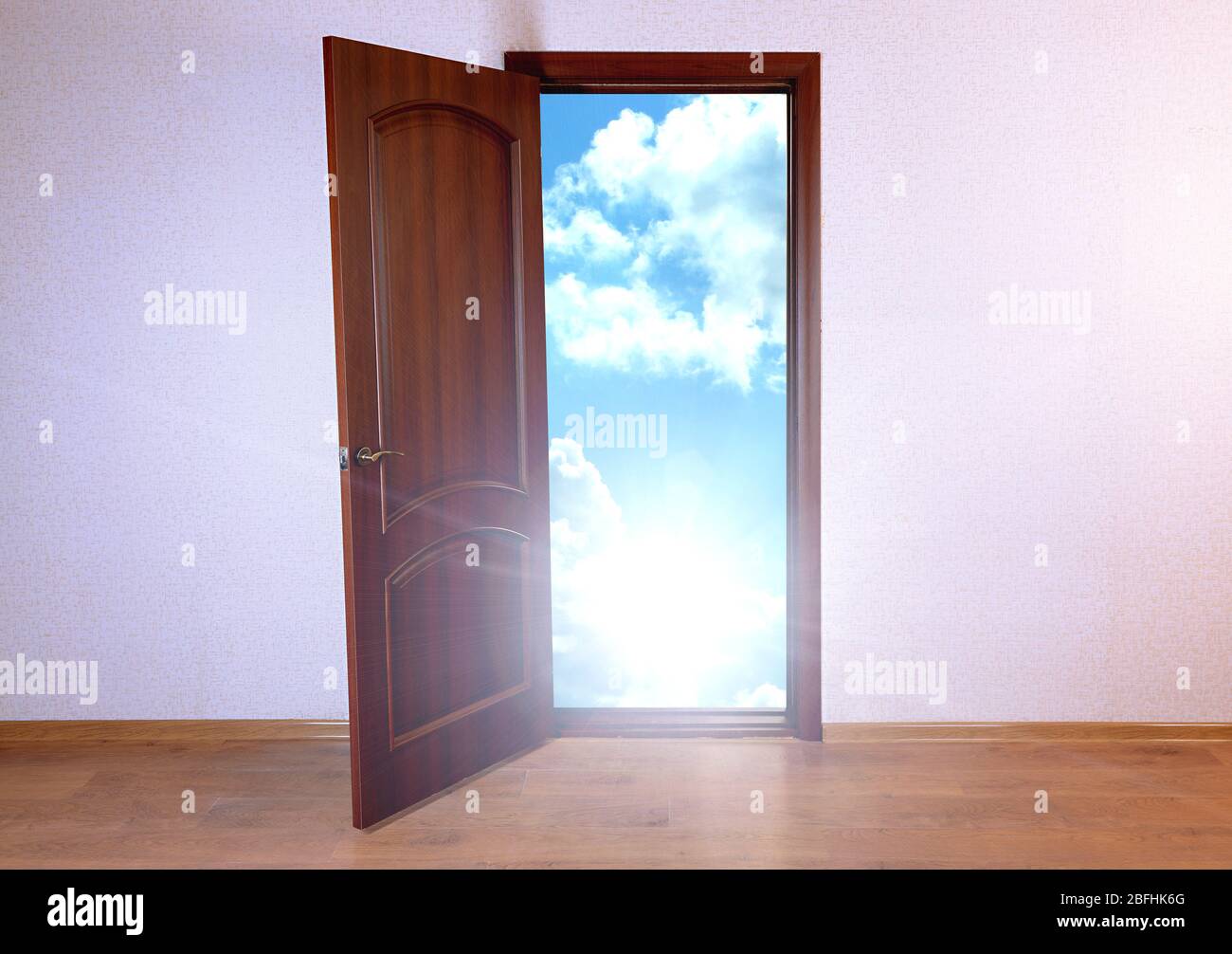 Open door to new life in room Stock Photo - Alamy