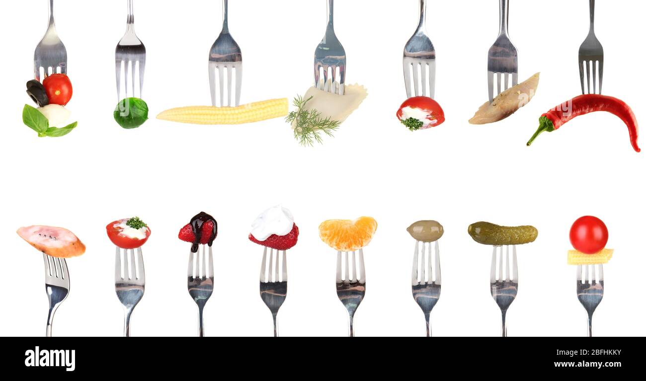 Collage of food on forks isolated on white Stock Photo - Alamy
