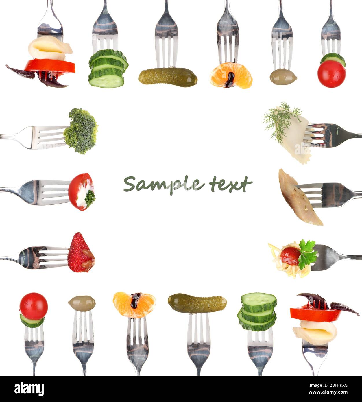 Collage of food on forks isolated on white Stock Photo - Alamy