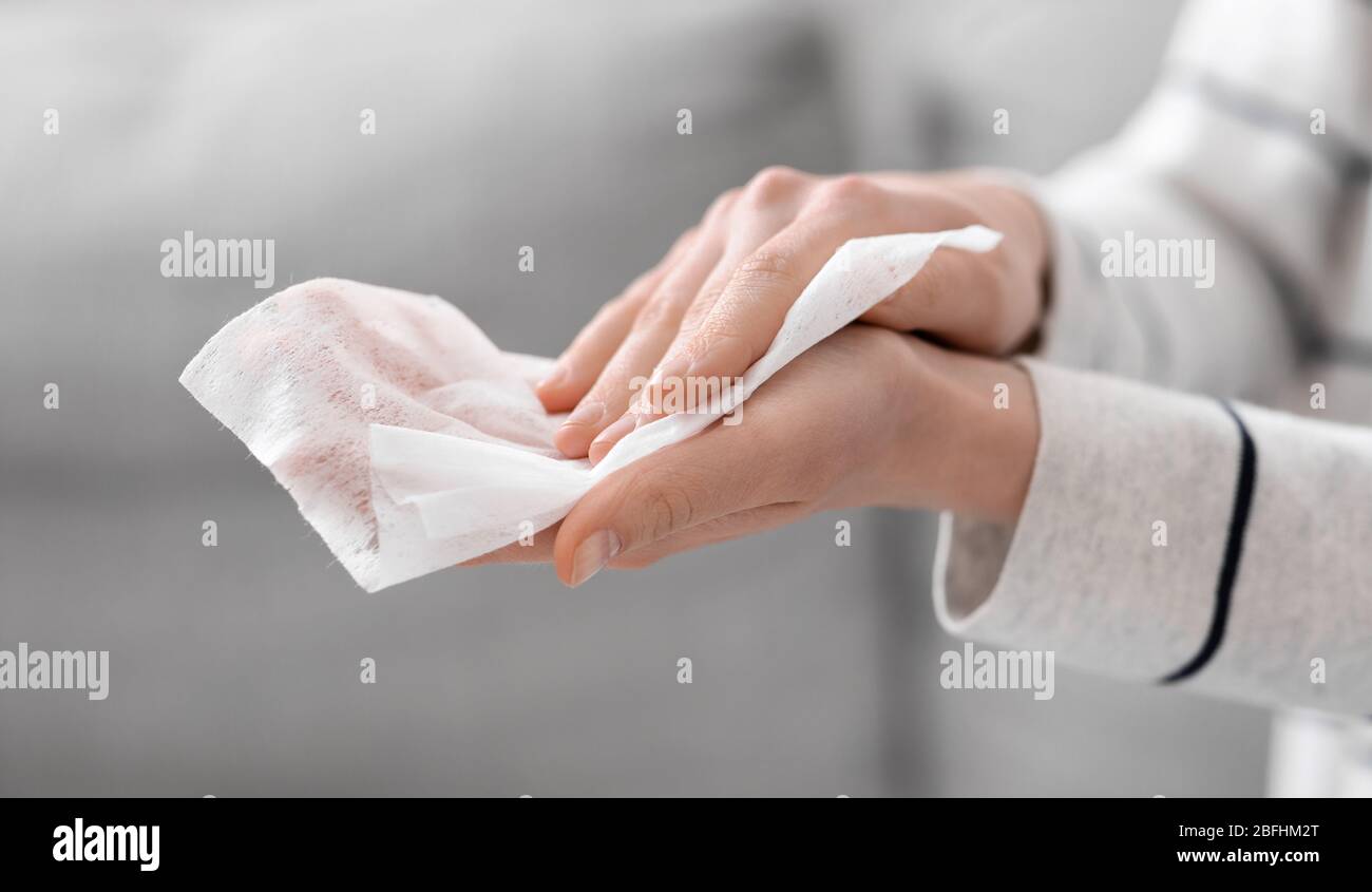 Girl washing hands with antibacterial napkins, close up Stock Photo - Alamy