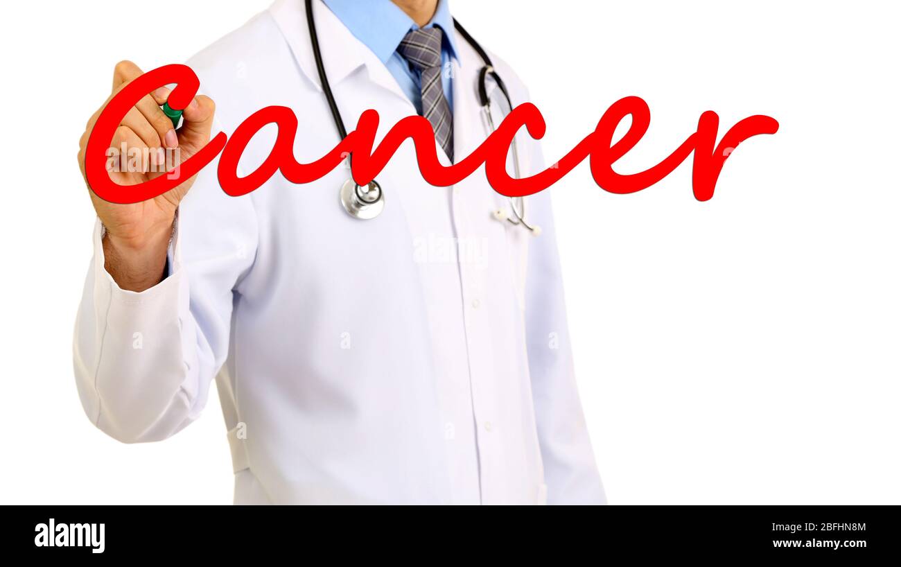 Doctor writing Cancer on transparent board Stock Photo - Alamy