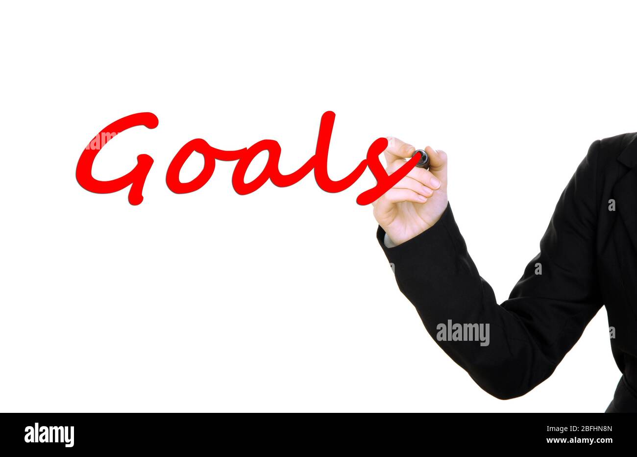 Hand writing word Goals on transparent board Stock Photo - Alamy