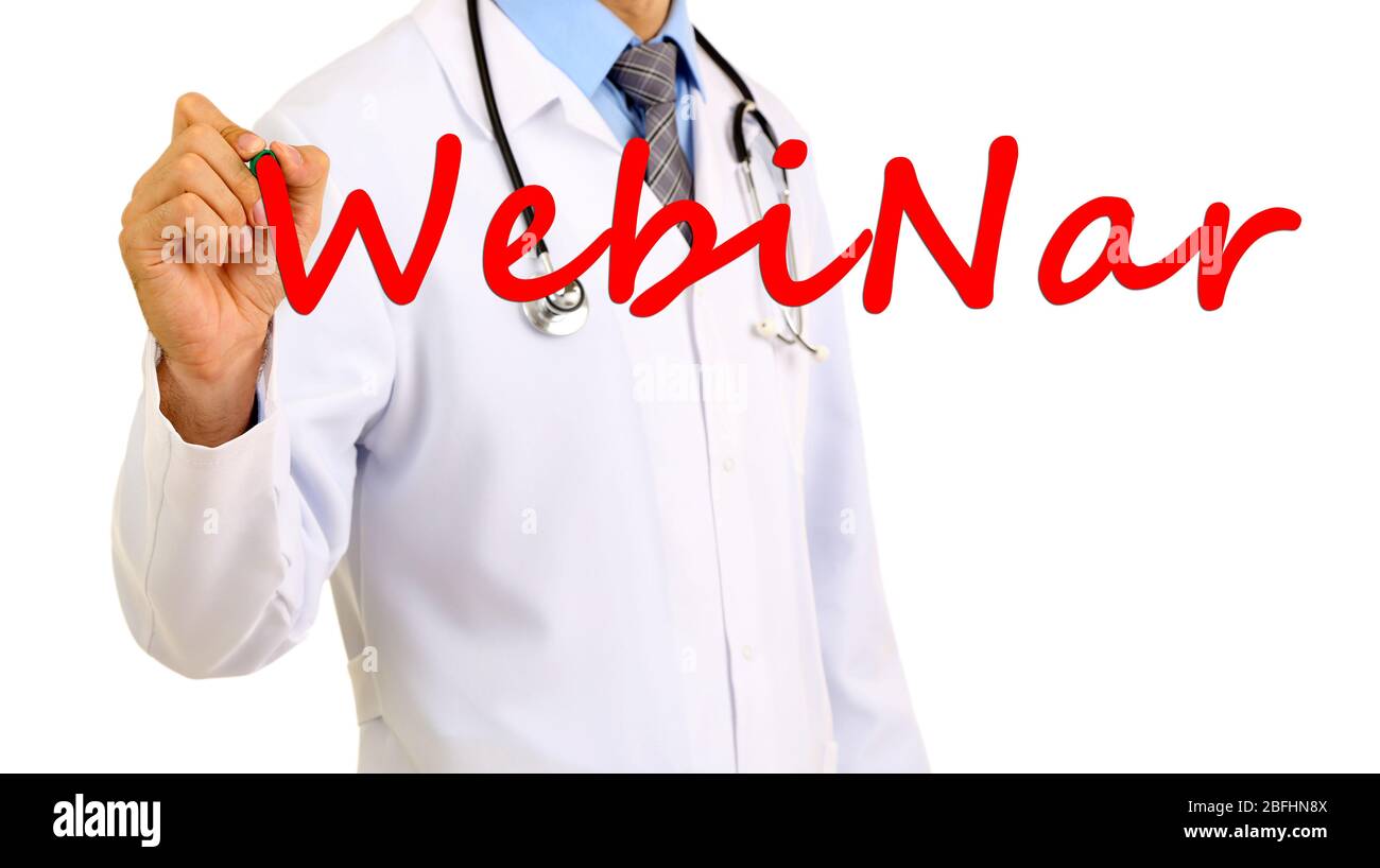 Doctor writing word Webinar on transparent board Stock Photo - Alamy