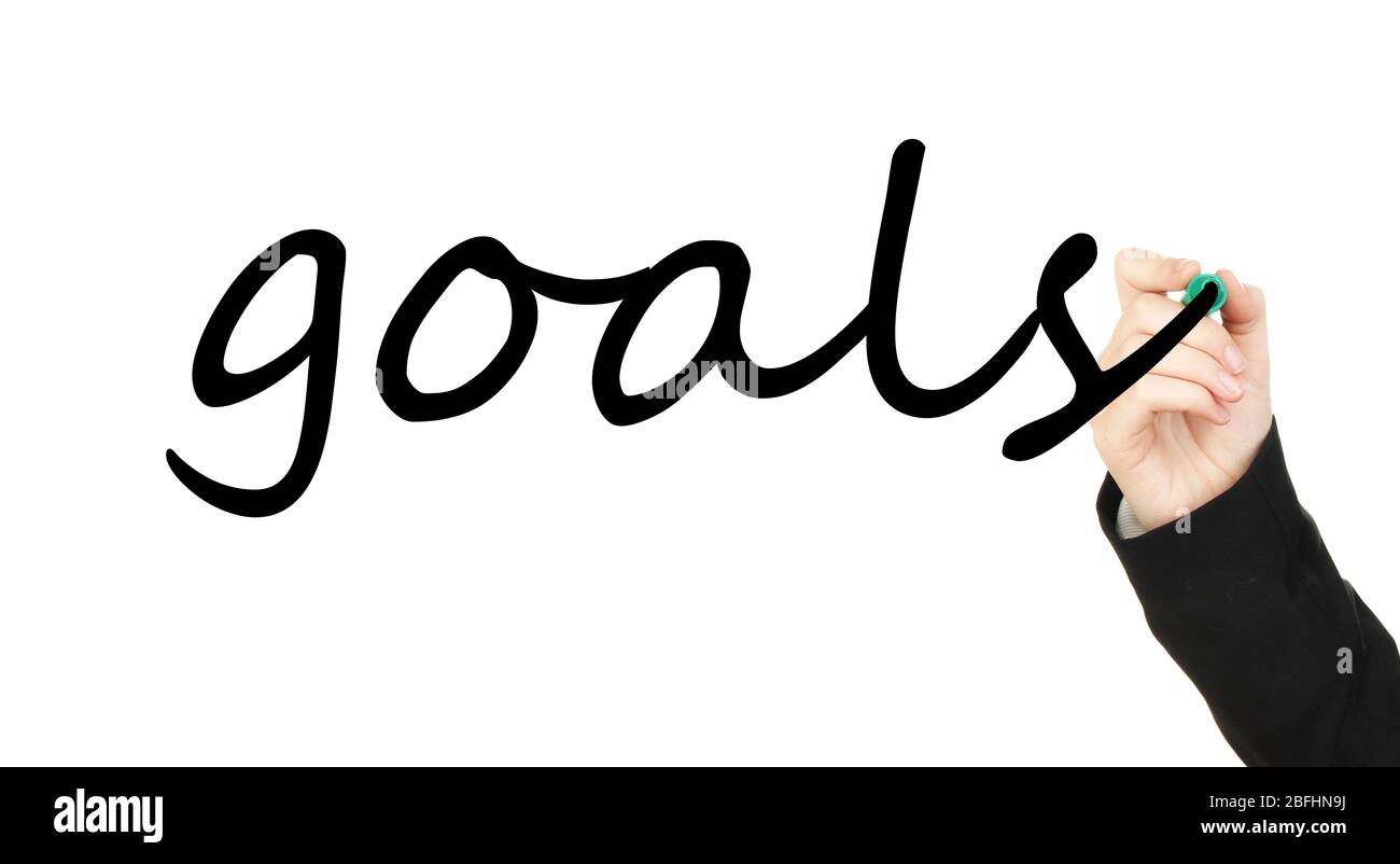 Hand writing word Goals on transparent board Stock Photo - Alamy