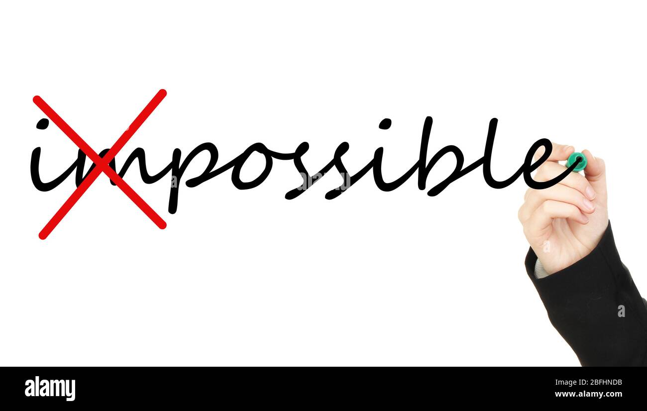 Human hand turning word impossible into possible Stock Photo - Alamy