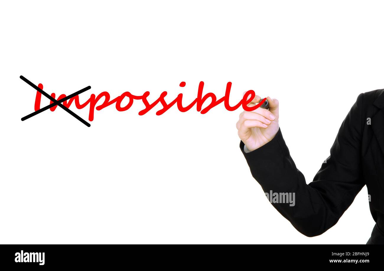 Human hand turning word impossible into possible Stock Photo - Alamy