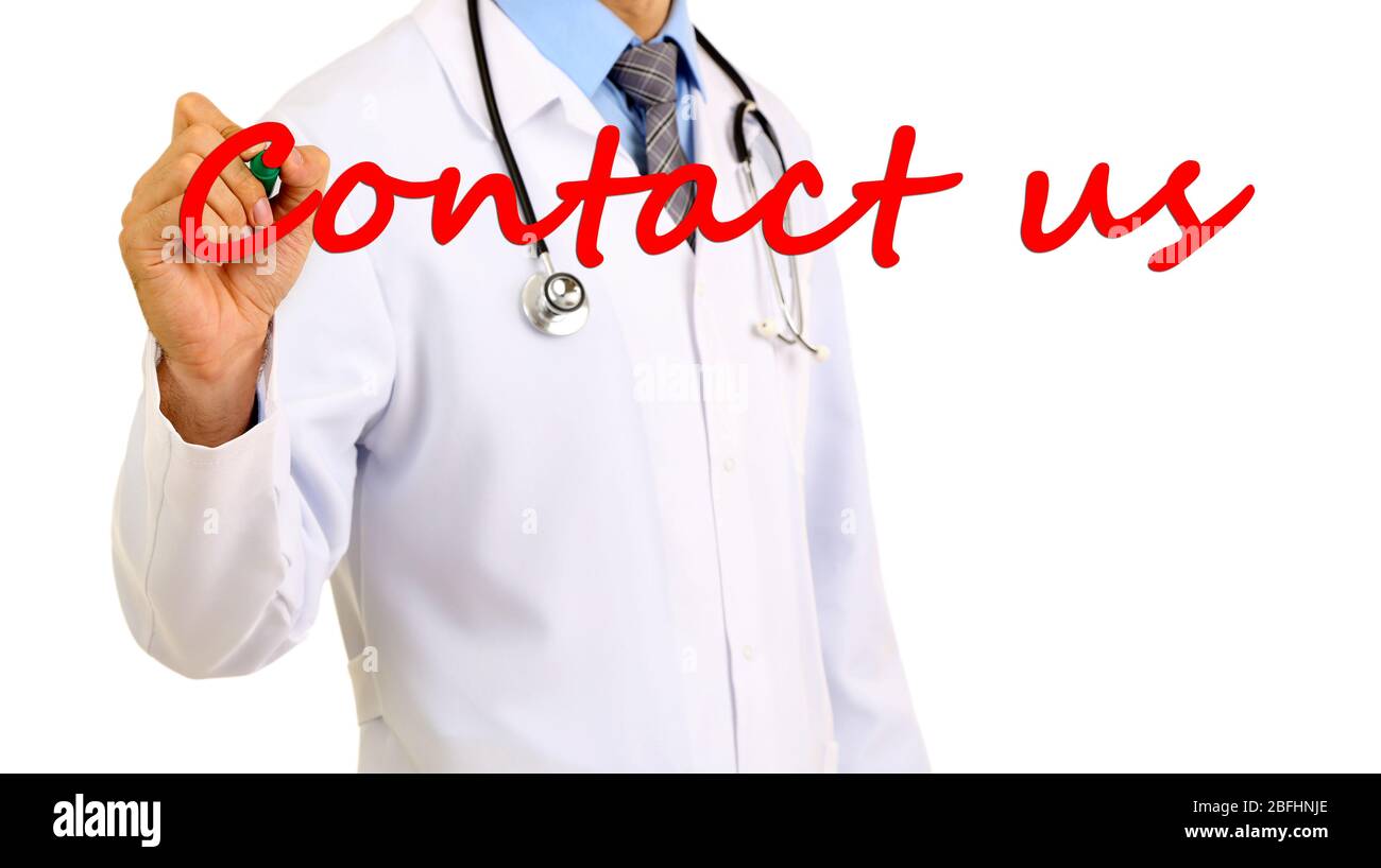 Doctor writing Contact us on transparent board Stock Photo - Alamy
