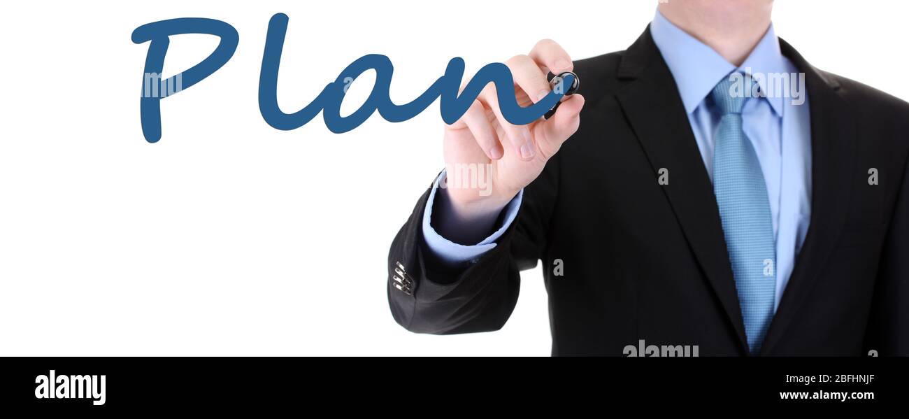 Businessman writing word Plan on transparent board Stock Photo - Alamy
