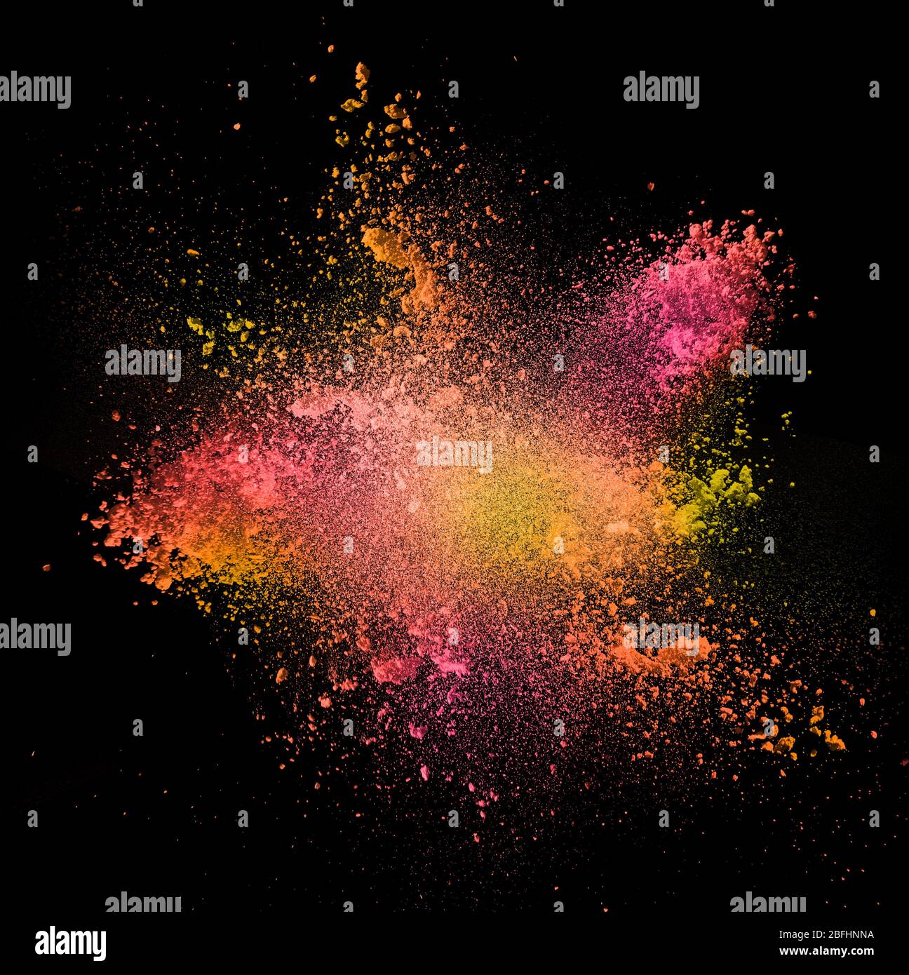 Colorful powders, on black background Stock Photo - Alamy