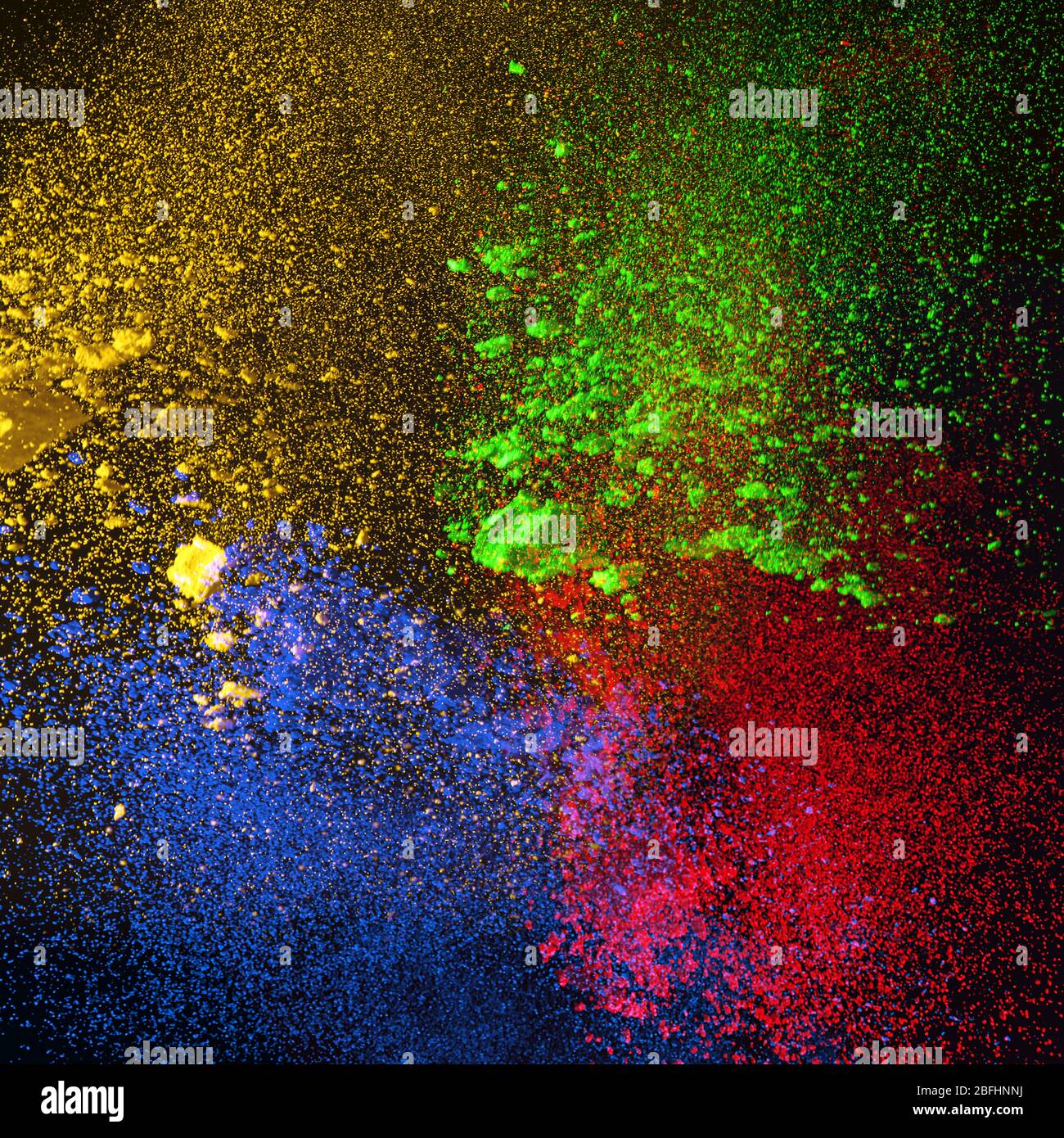 Colorful powders, on black background Stock Photo - Alamy