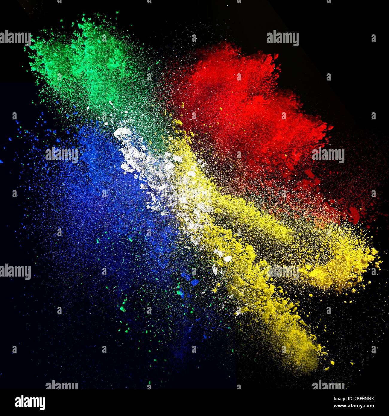 Colorful powders, on black background Stock Photo - Alamy