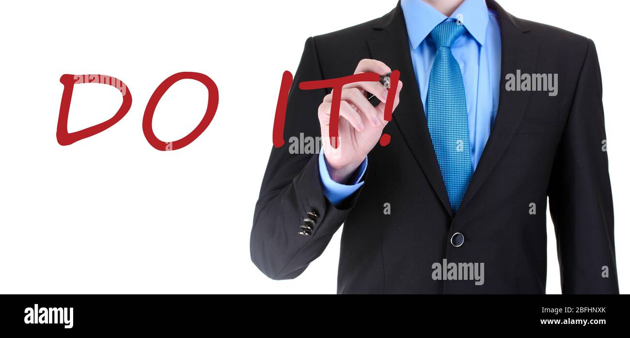Businessman writing Do it on transparent board Stock Photo - Alamy