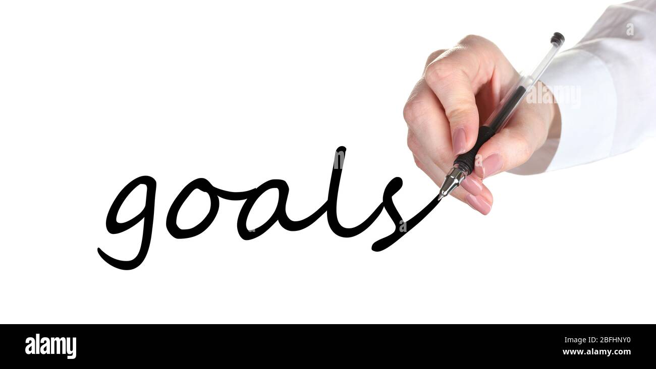 Goals hand writing on transparent board Stock Photo - Alamy