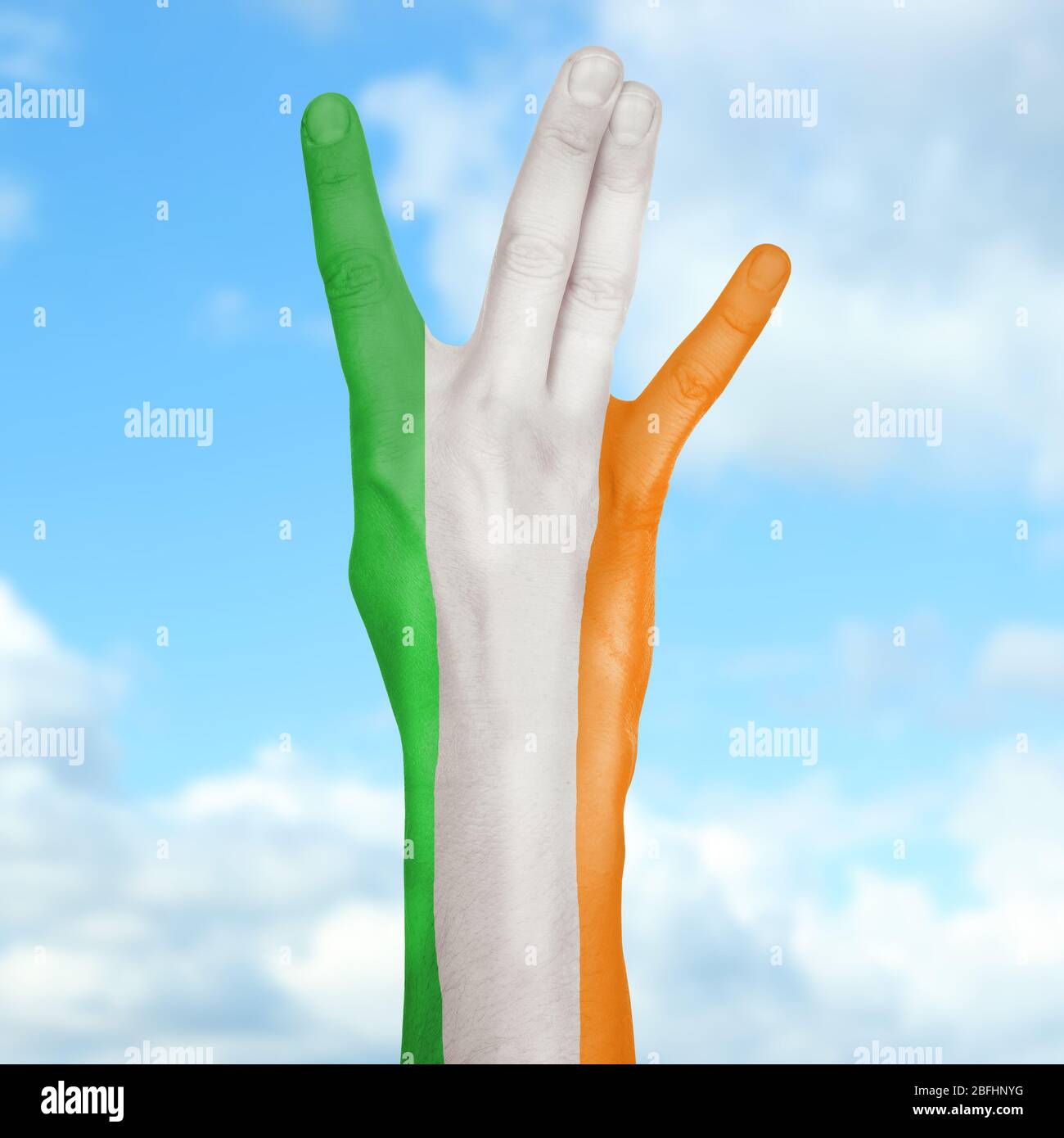 Flag of Ireland painted on hand Stock Photo - Alamy