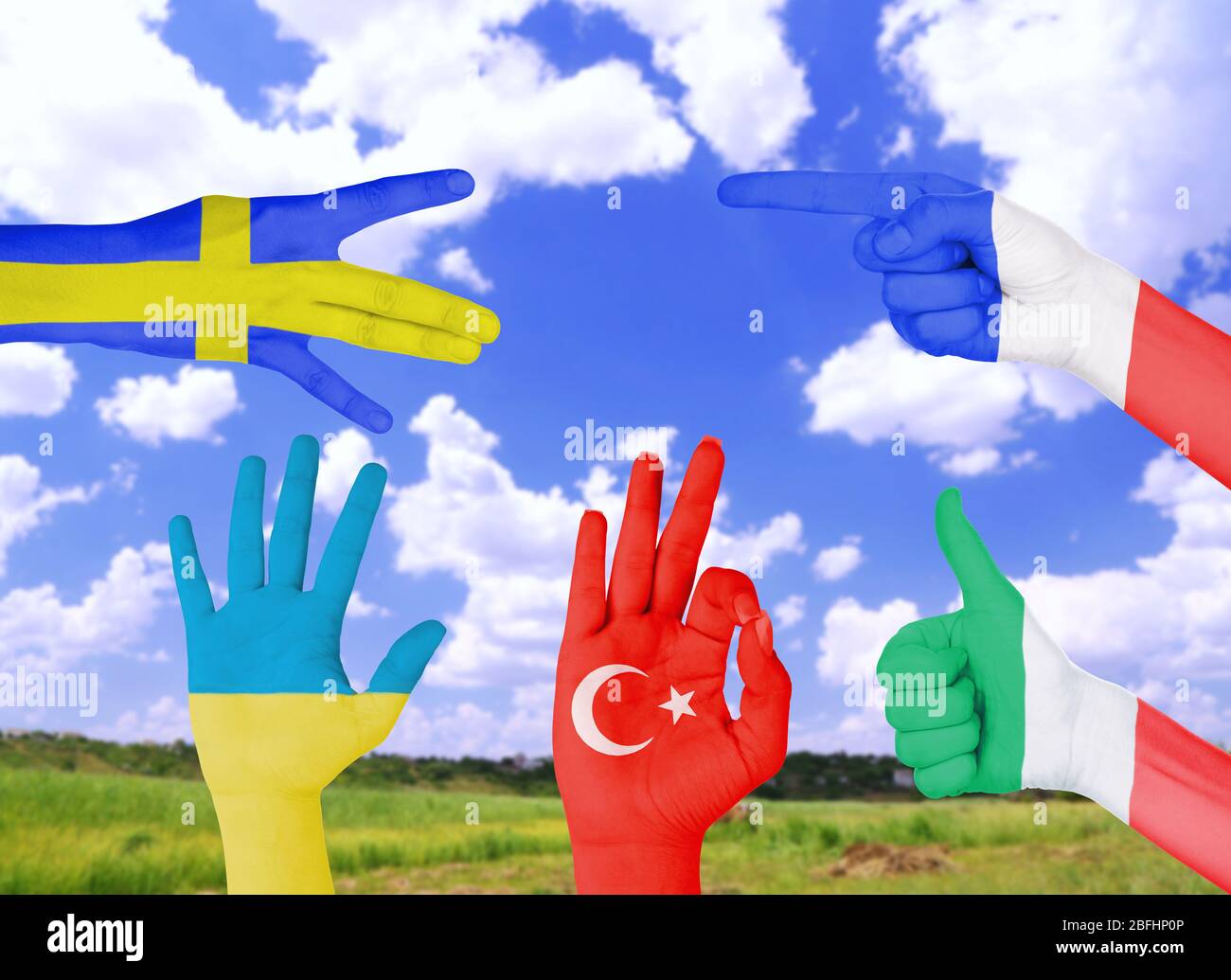 Flag of different countries painted on hand Stock Photo - Alamy