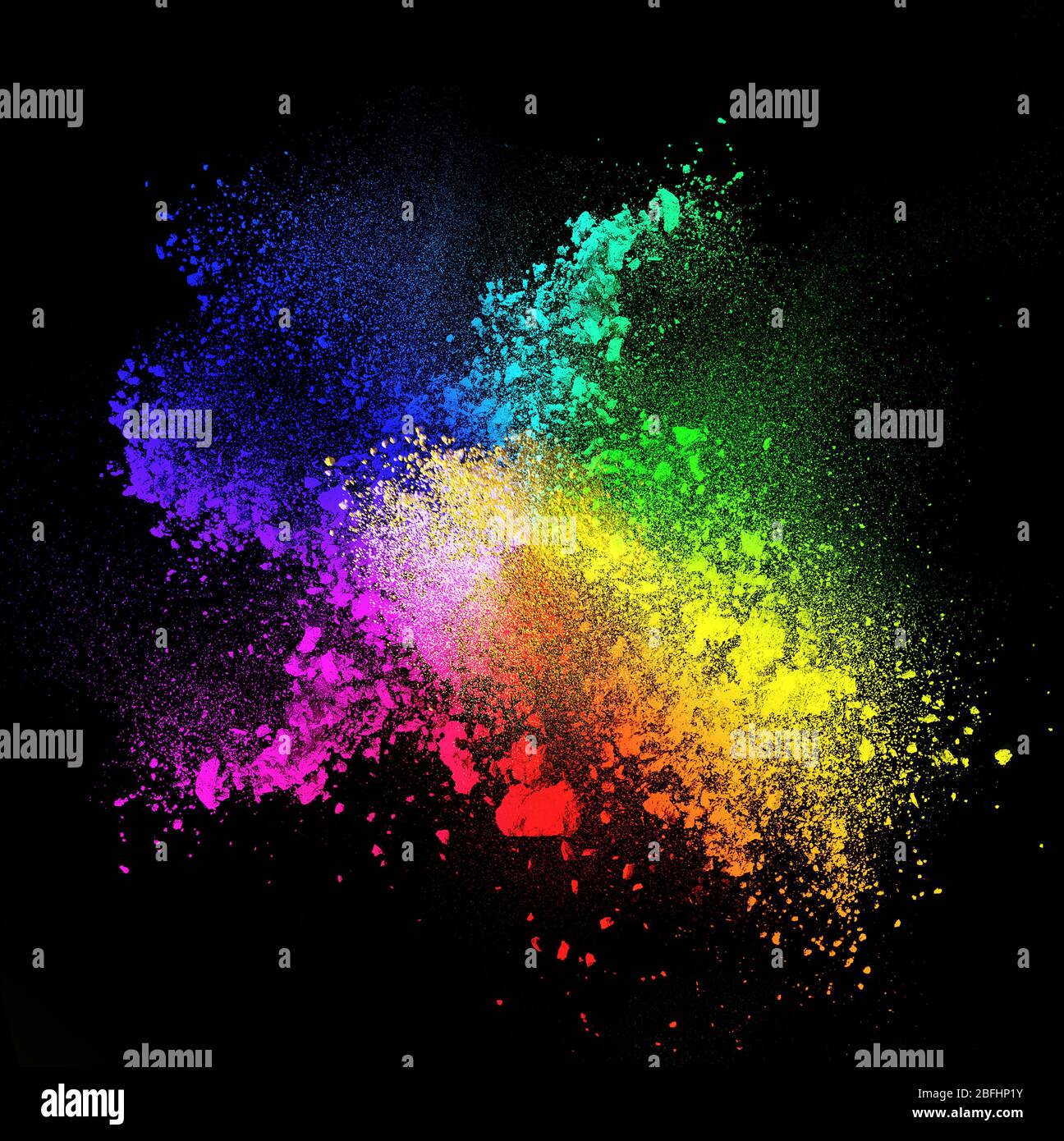Colorful powders, on black background Stock Photo - Alamy