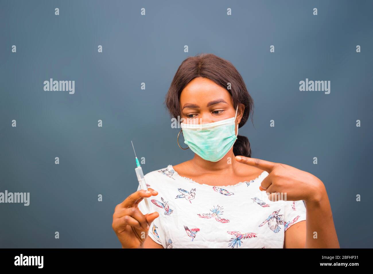 Doctor holding syringe and getting ready for injection,female doctor ...