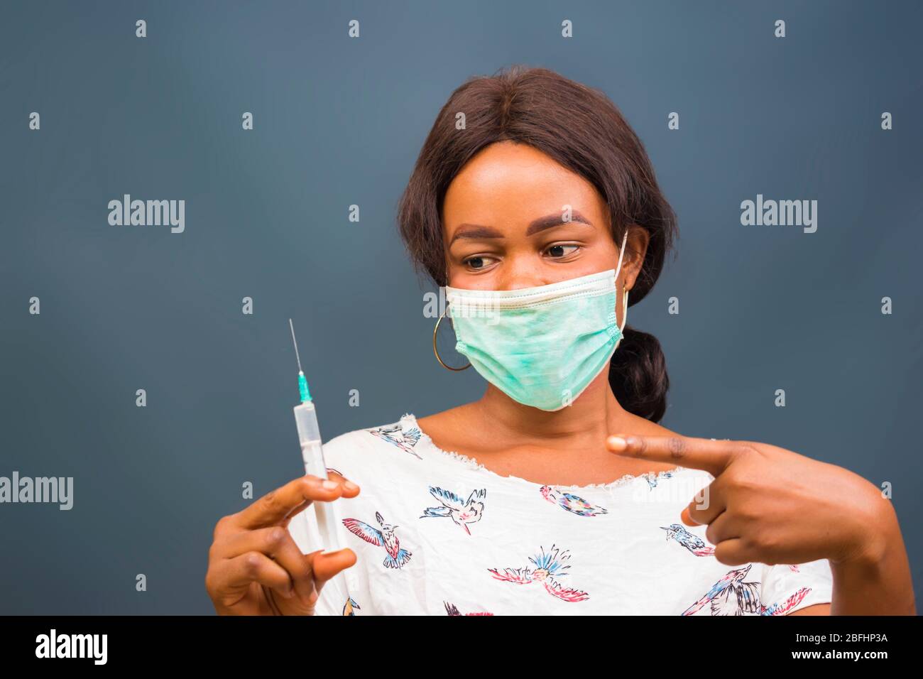 Doctor holding syringe and getting ready for injection,female doctor ...