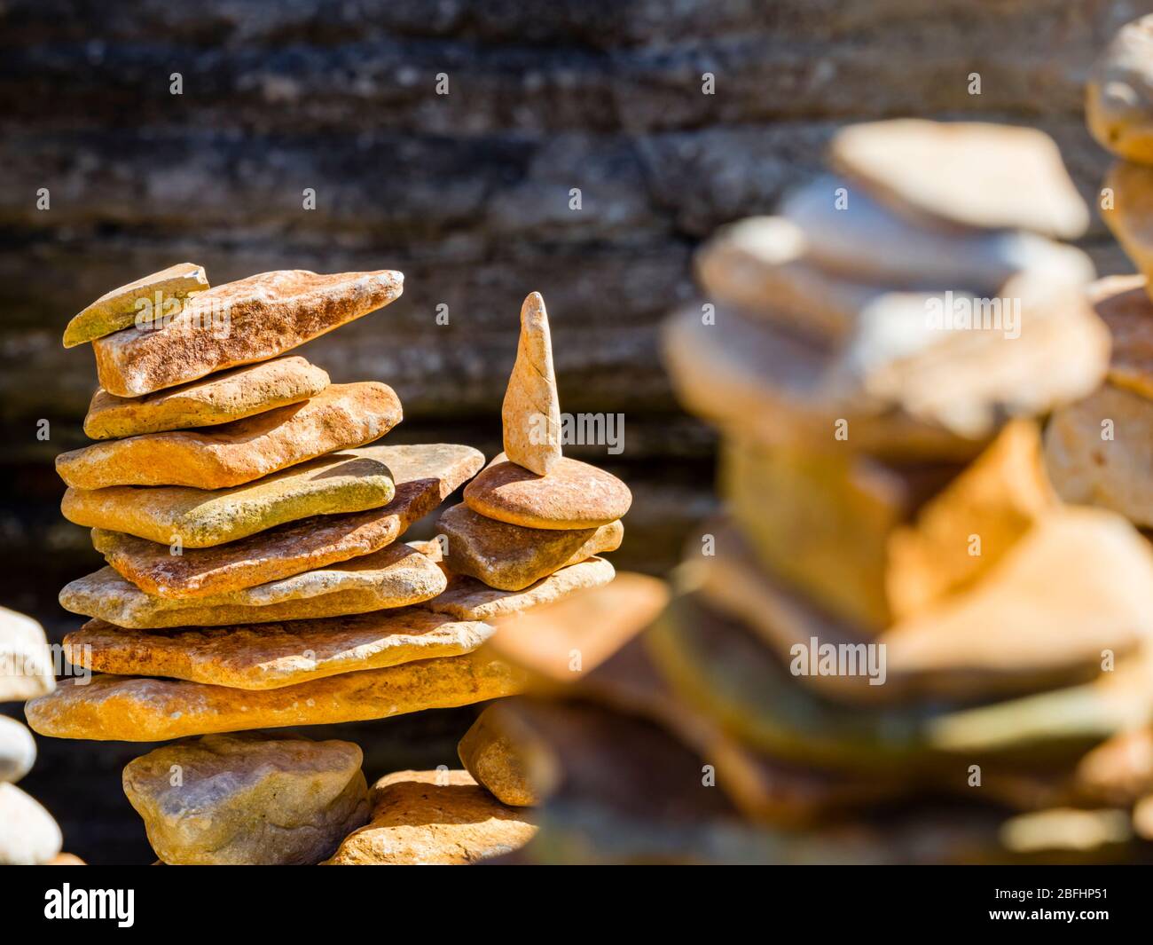 Piled stones on beach prominent sharp pointy to point stone rock ...