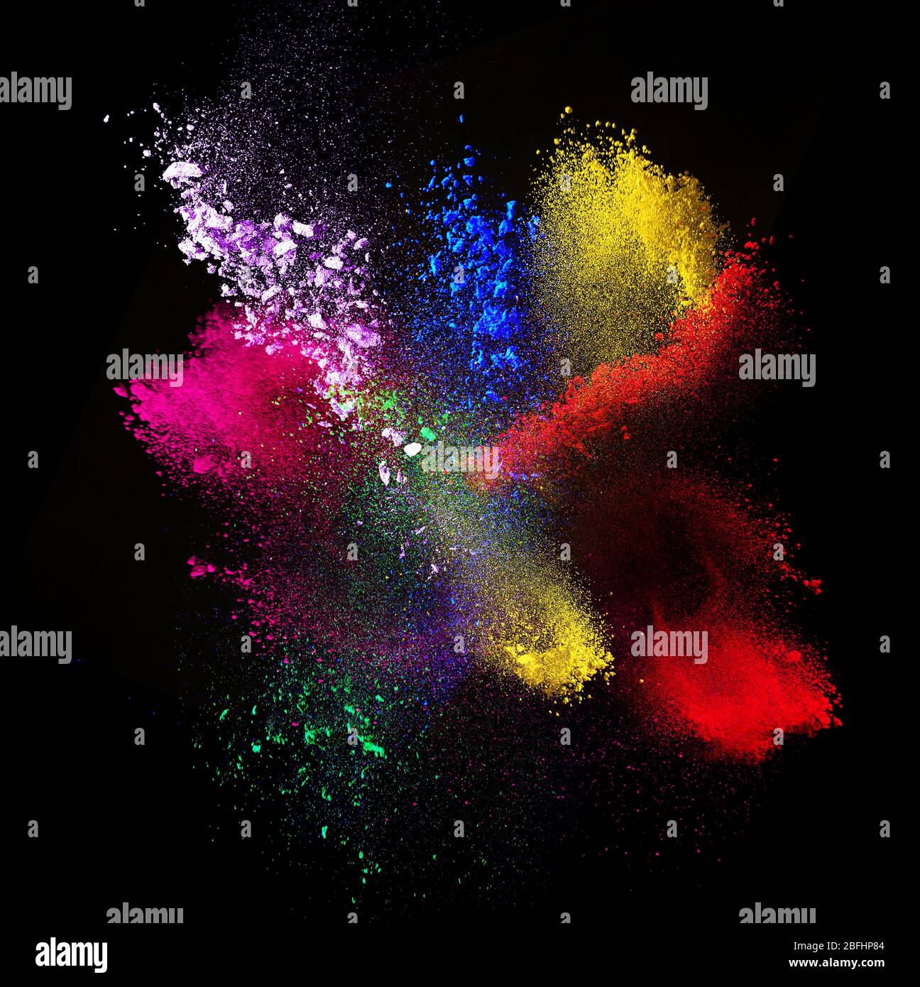Colorful powders, on black background Stock Photo - Alamy