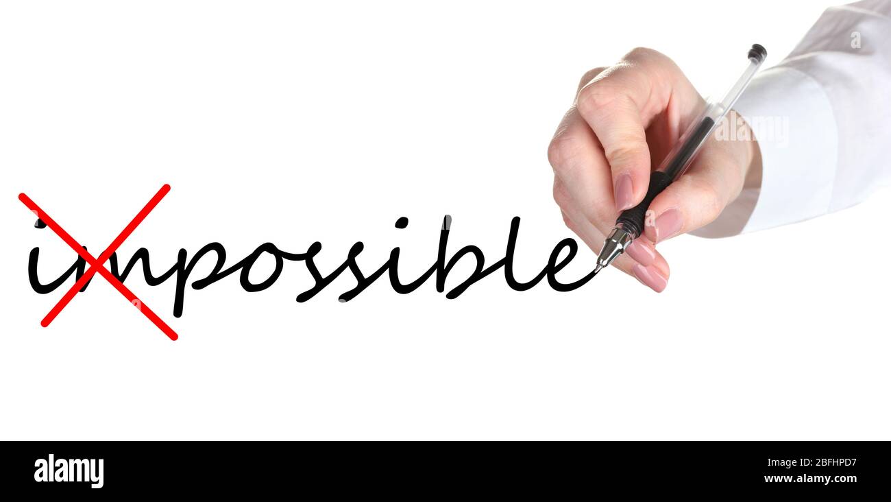 Human hand turning word impossible into possible Stock Photo - Alamy