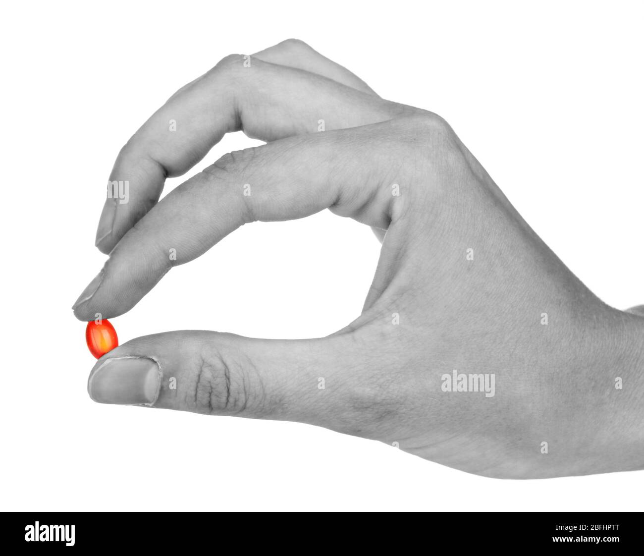 Drug abuse concept - hand holding pill Stock Photo - Alamy