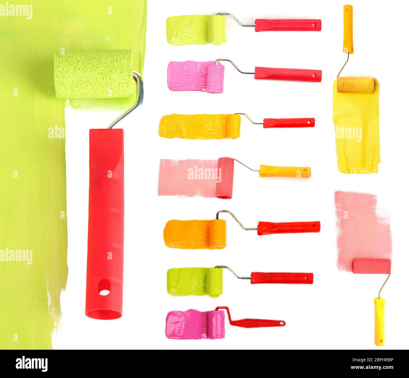Roller brushes with color paint isolated on white Stock Photo - Alamy