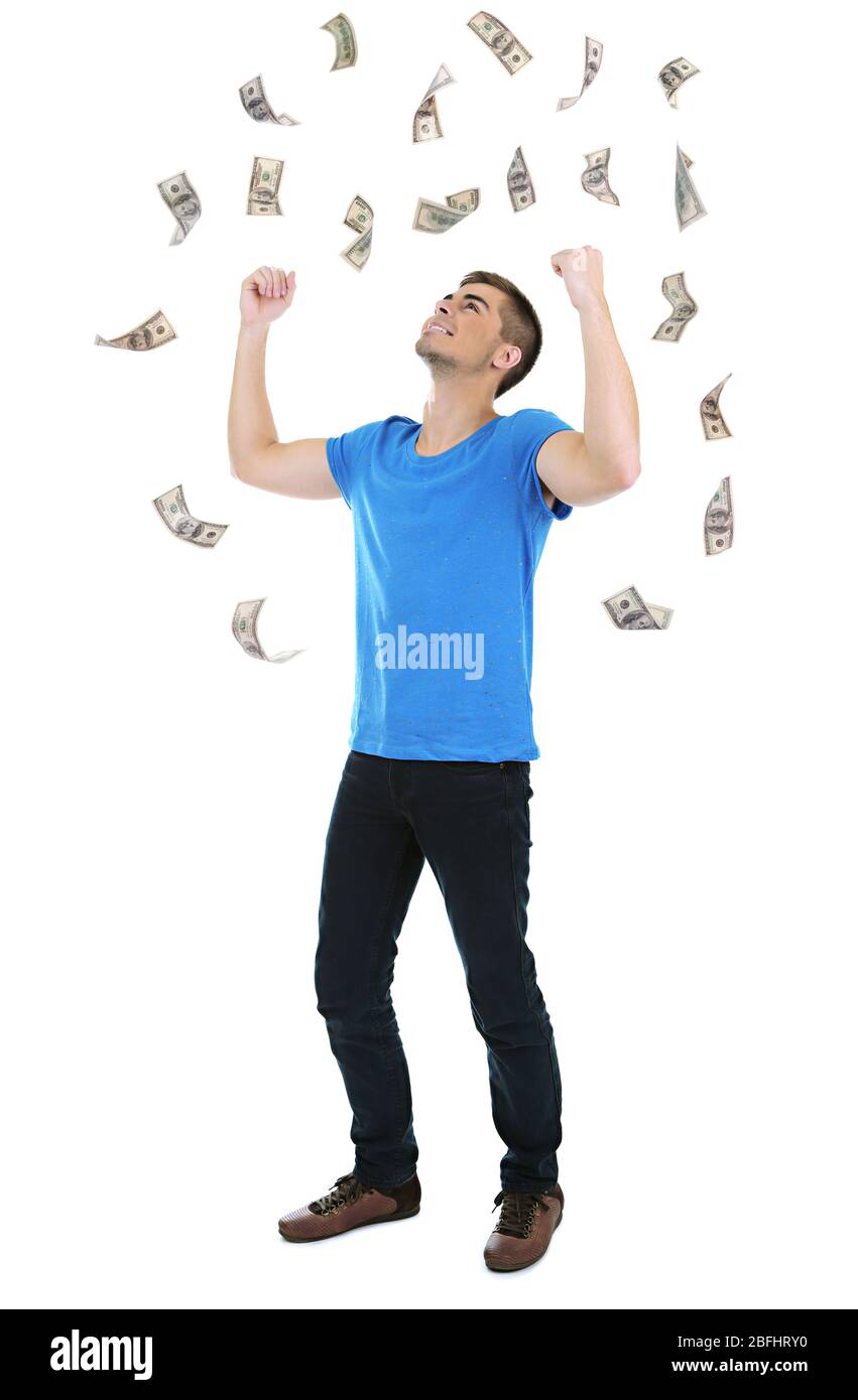 Happy man enjoying rain of money, isolated on white Stock Photo - Alamy