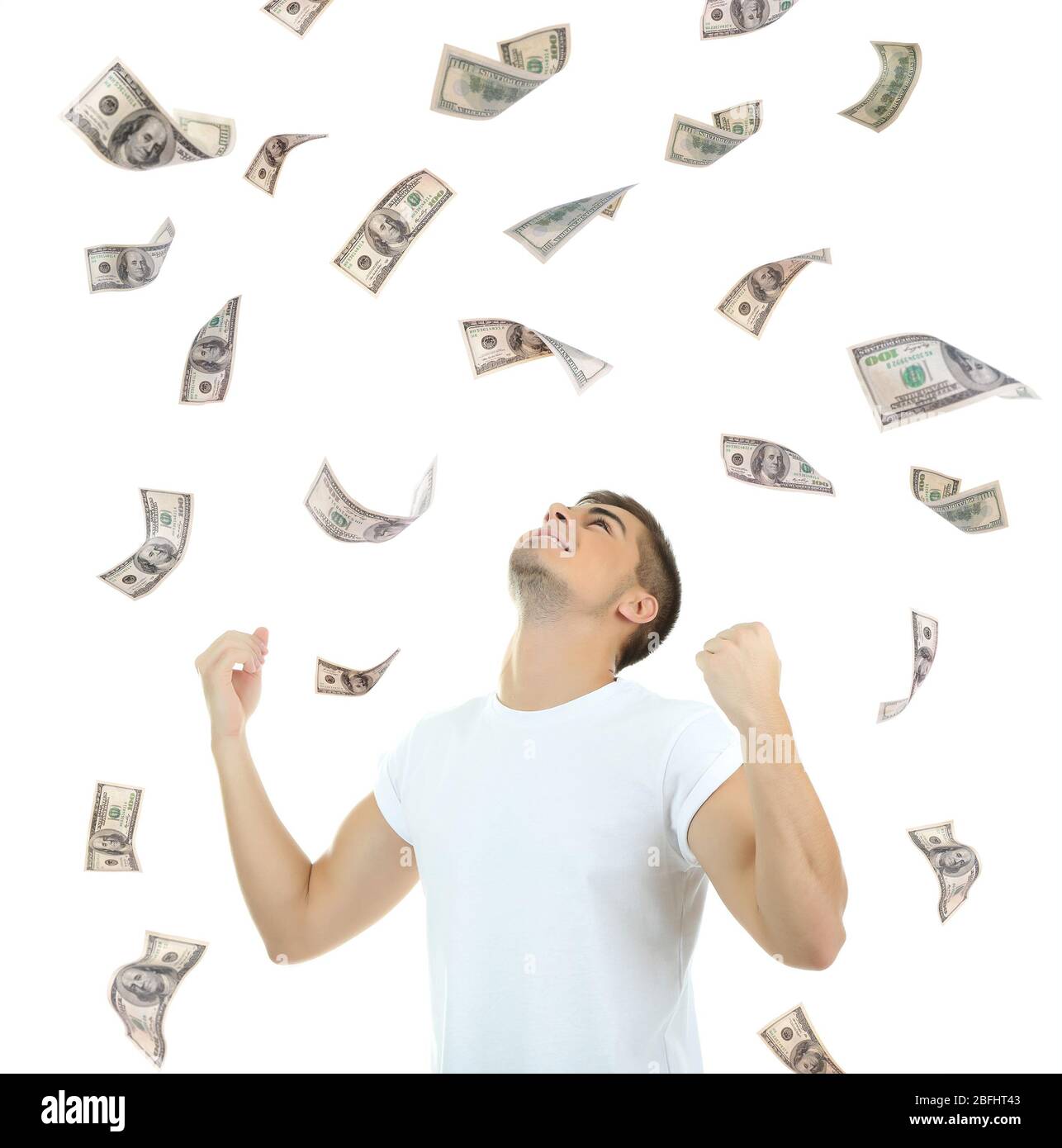 Happy man enjoying rain of money, isolated on white Stock Photo - Alamy