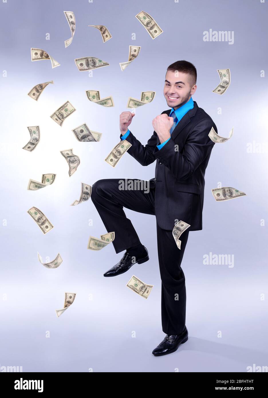 Man winning money falling hi-res stock photography and images - Alamy