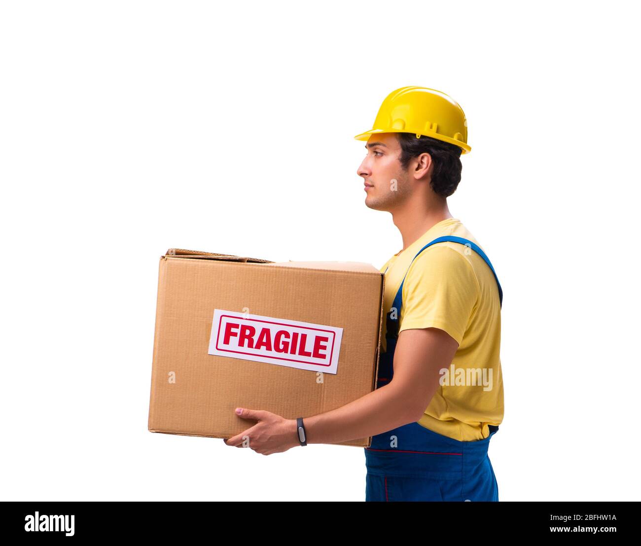 The young contractor with fragile boxes isolated on white Stock Photo ...