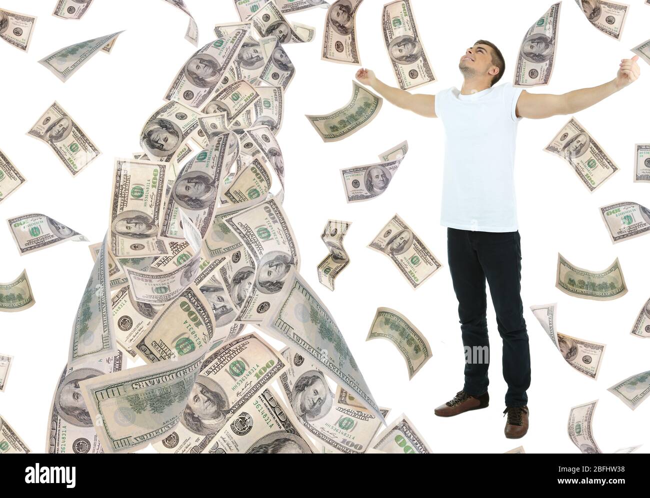 Happy man enjoying rain of money, isolated on white Stock Photo - Alamy