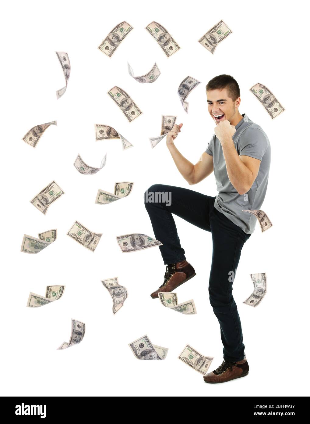 Happy man enjoying rain of money, isolated on white Stock Photo - Alamy