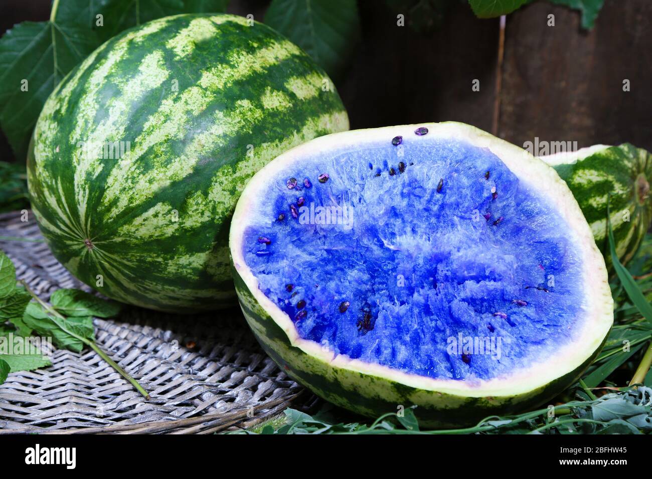Blue watermelons on wicker tray Stock Photo - Alamy