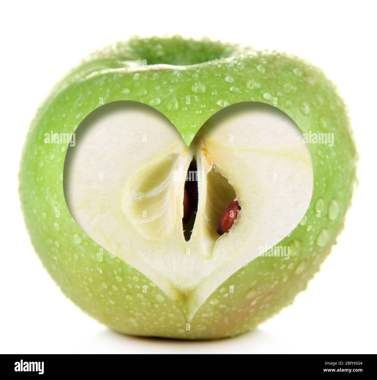 Green apple with heart hi-res stock photography and images - Alamy
