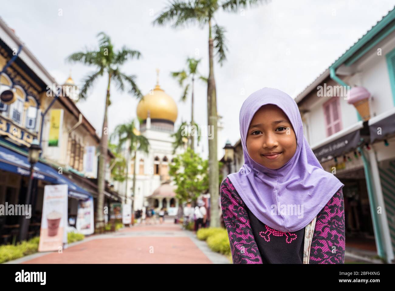 Singapore / Singapore - February 15, 2019: Portrait of Muslim girl with ...