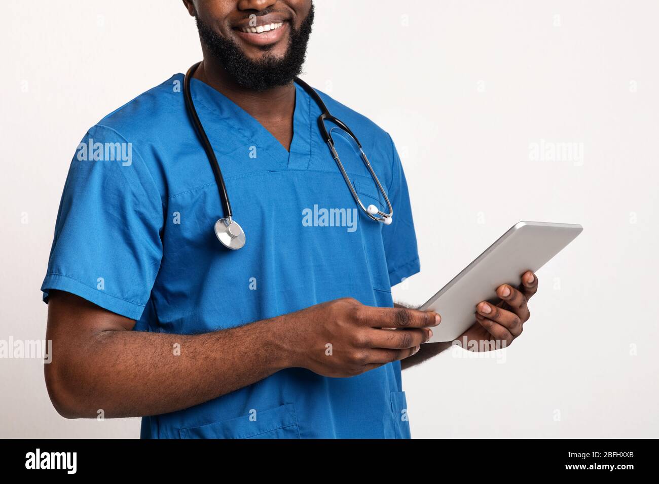 Cropped black doctor using hi-res stock photography and images - Alamy