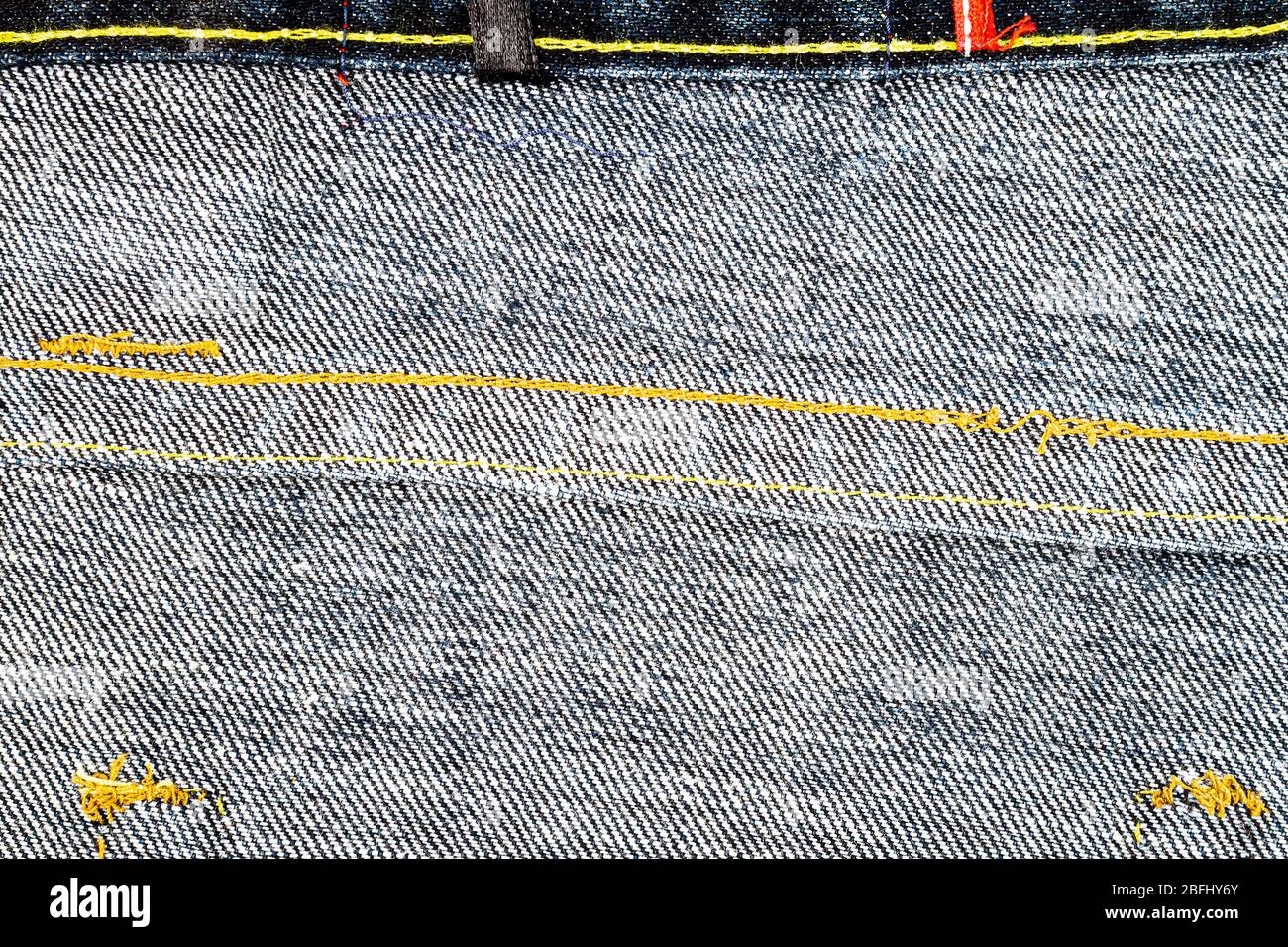 Wrong side of jeans fabric with back seam Stock Photo - Alamy