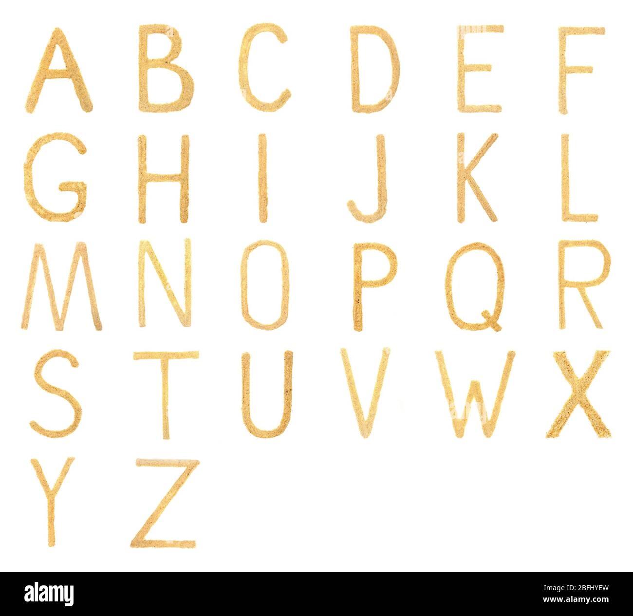 Sand alphabet letters isolated on white Stock Photo - Alamy