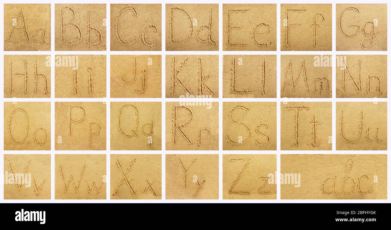 Handwritten alphabet letters on sand background Stock Photo - Alamy
